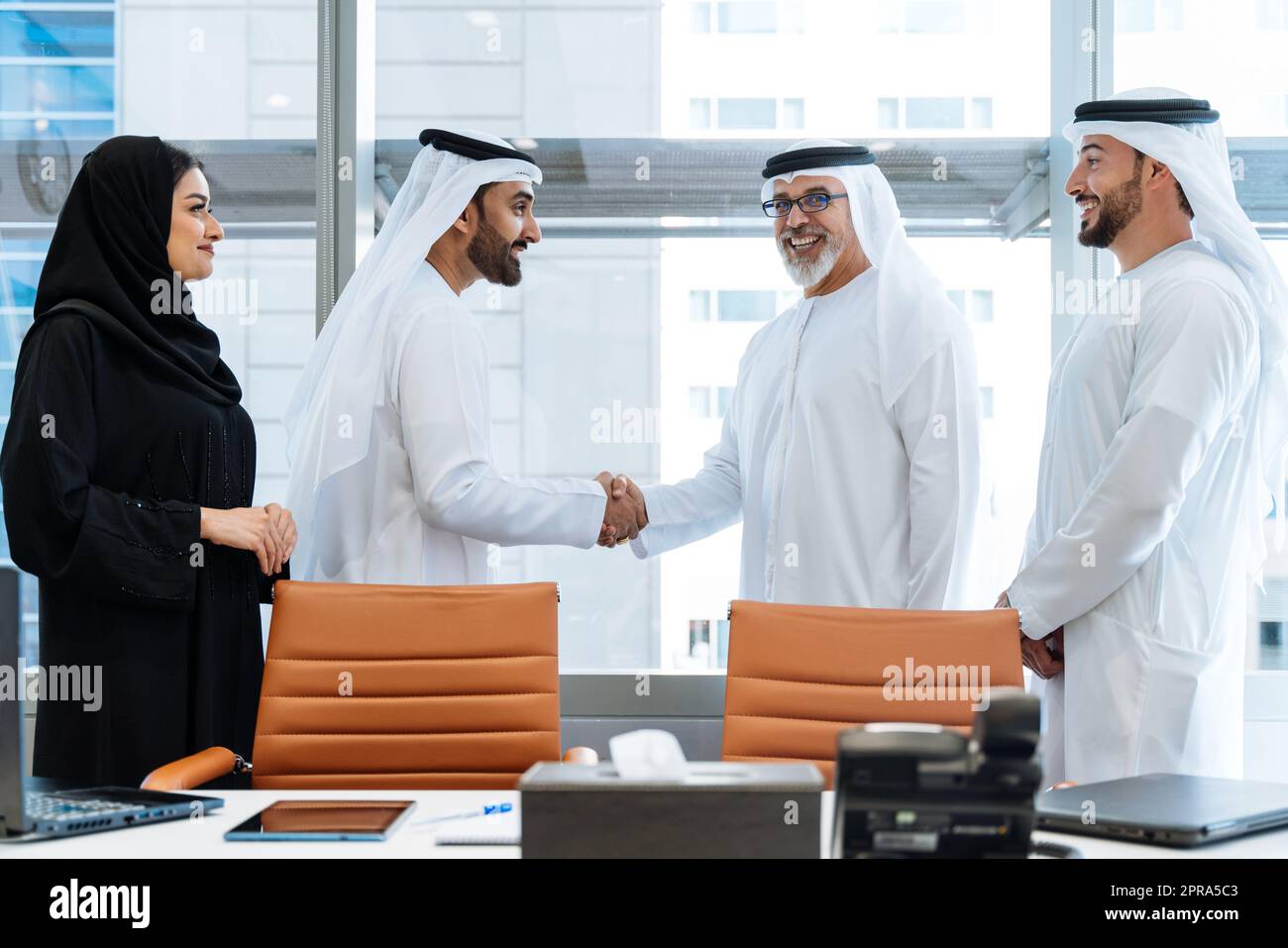 Group of middle-eastern corporate business people wearing traditional ...