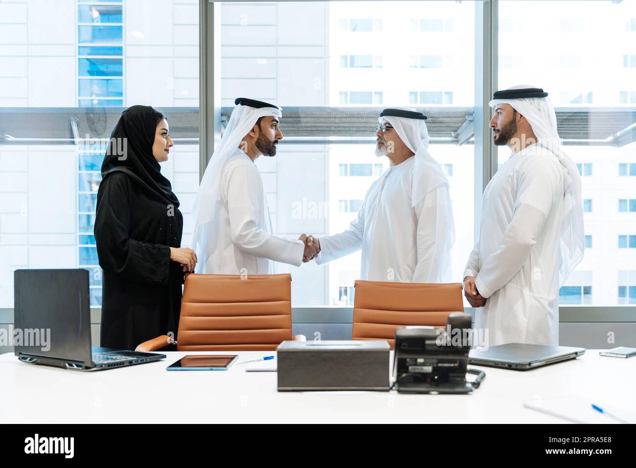 Group of middle-eastern corporate business people wearing traditional ...
