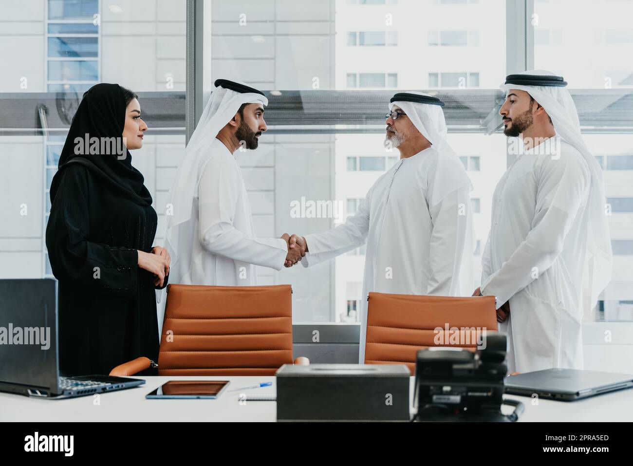 Group of middle-eastern corporate business people wearing traditional ...