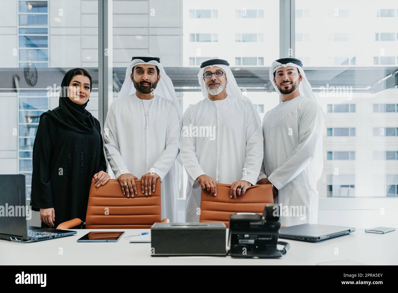 Group of middle-eastern corporate business people wearing traditional ...