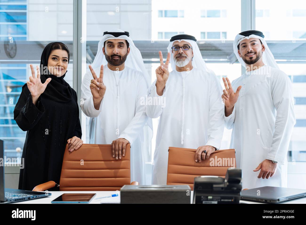 Group of middle-eastern corporate business people wearing traditional ...