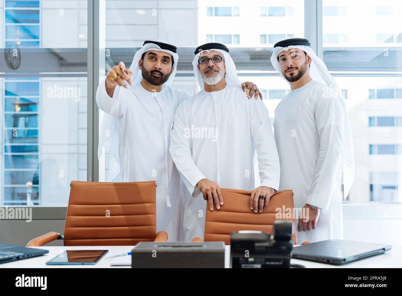 Group of middle-eastern corporate business people wearing traditional ...
