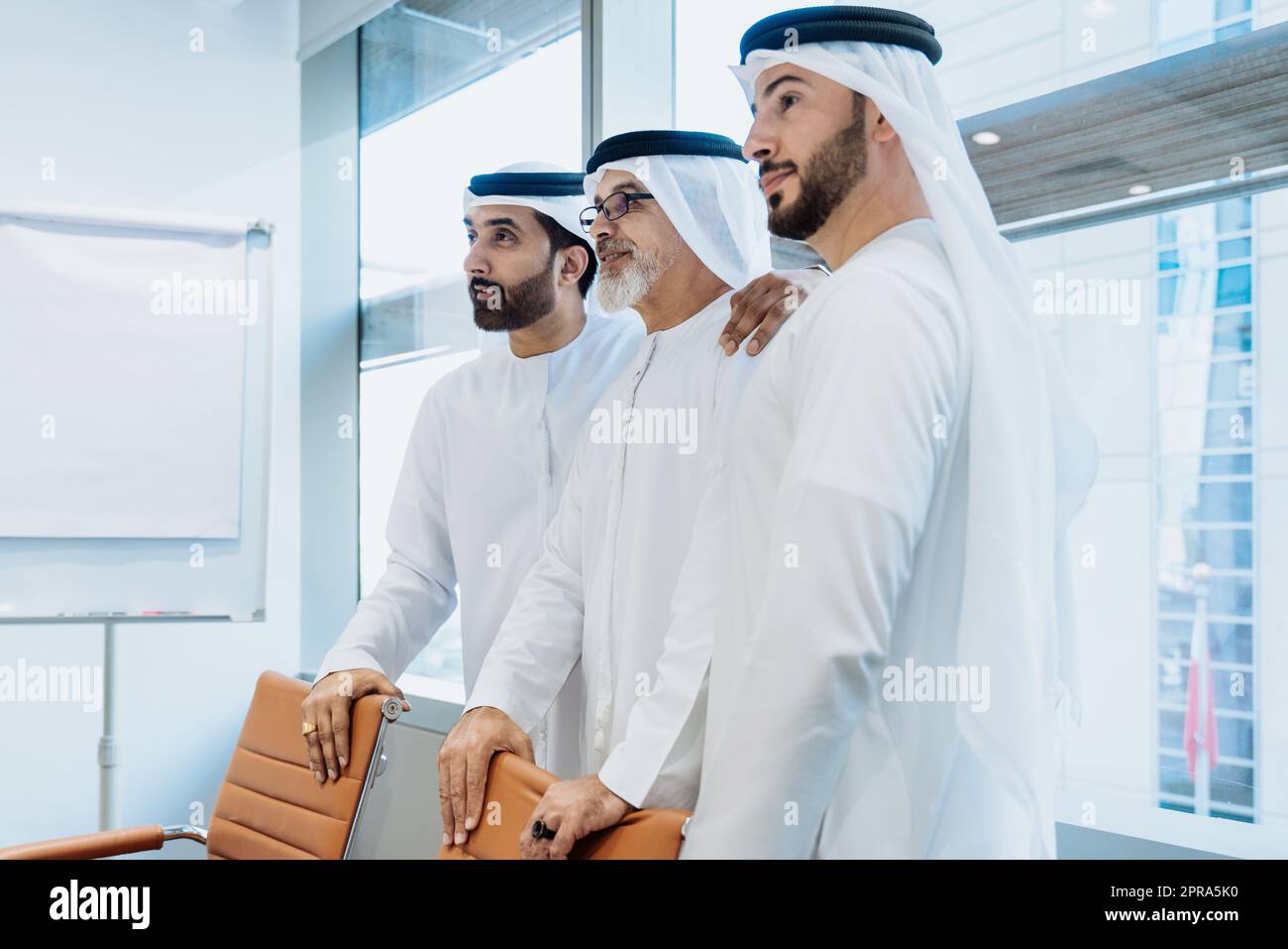 Group of middle-eastern corporate business people wearing traditional ...
