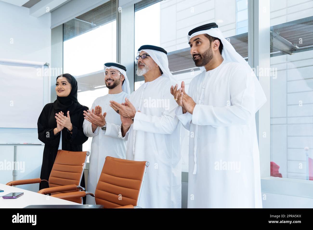 Group of middle-eastern corporate business people wearing traditional ...