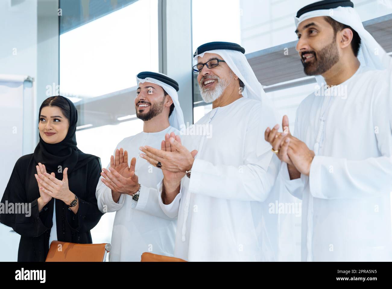 Group of middle-eastern corporate business people wearing traditional ...