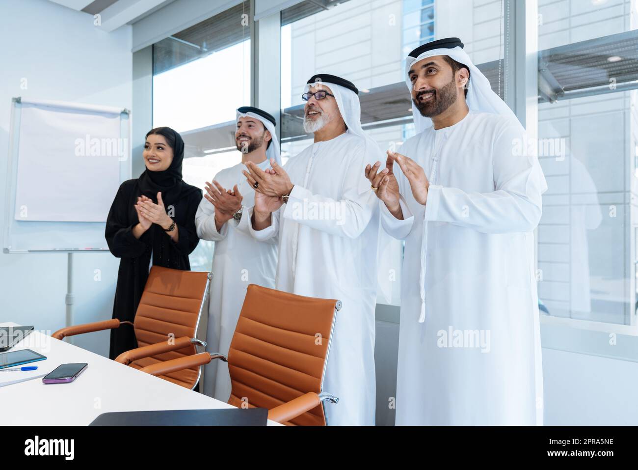 Group of middle-eastern corporate business people wearing traditional ...