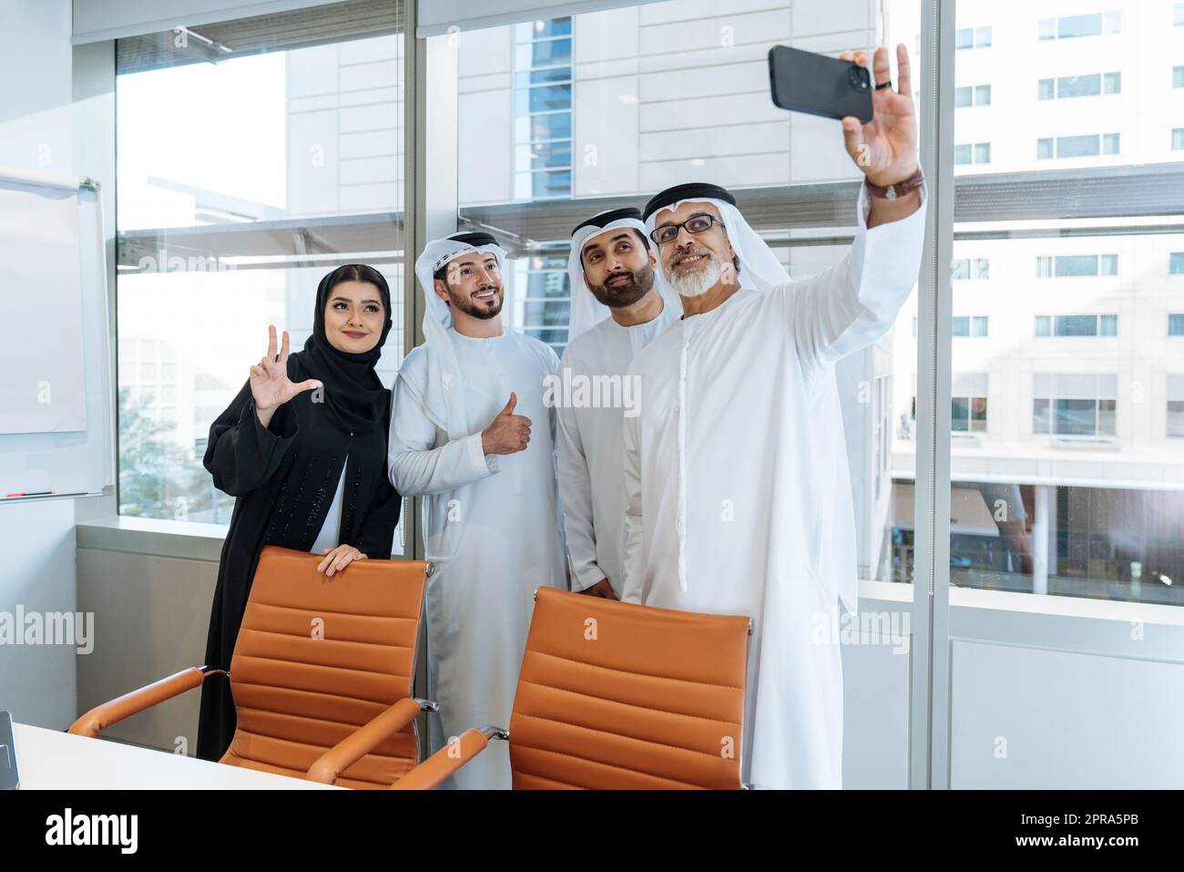 Group of middle-eastern corporate business people wearing traditional ...