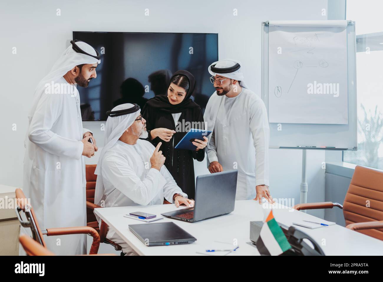 Group of middle-eastern corporate business people wearing traditional ...