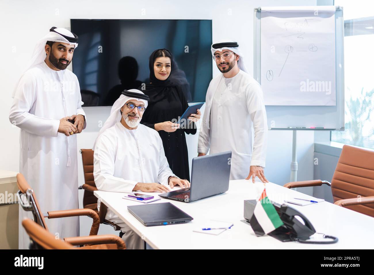 Group of middle-eastern corporate business people wearing traditional ...