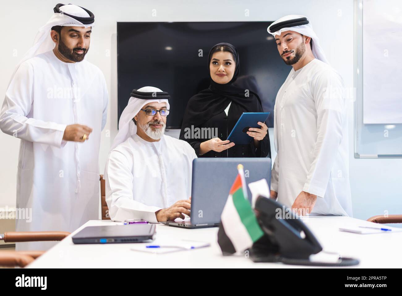 Group of middle-eastern corporate business people wearing traditional ...