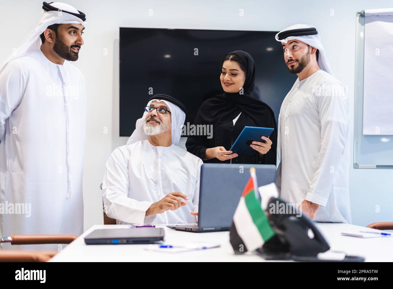 Group of middle-eastern corporate business people wearing traditional ...