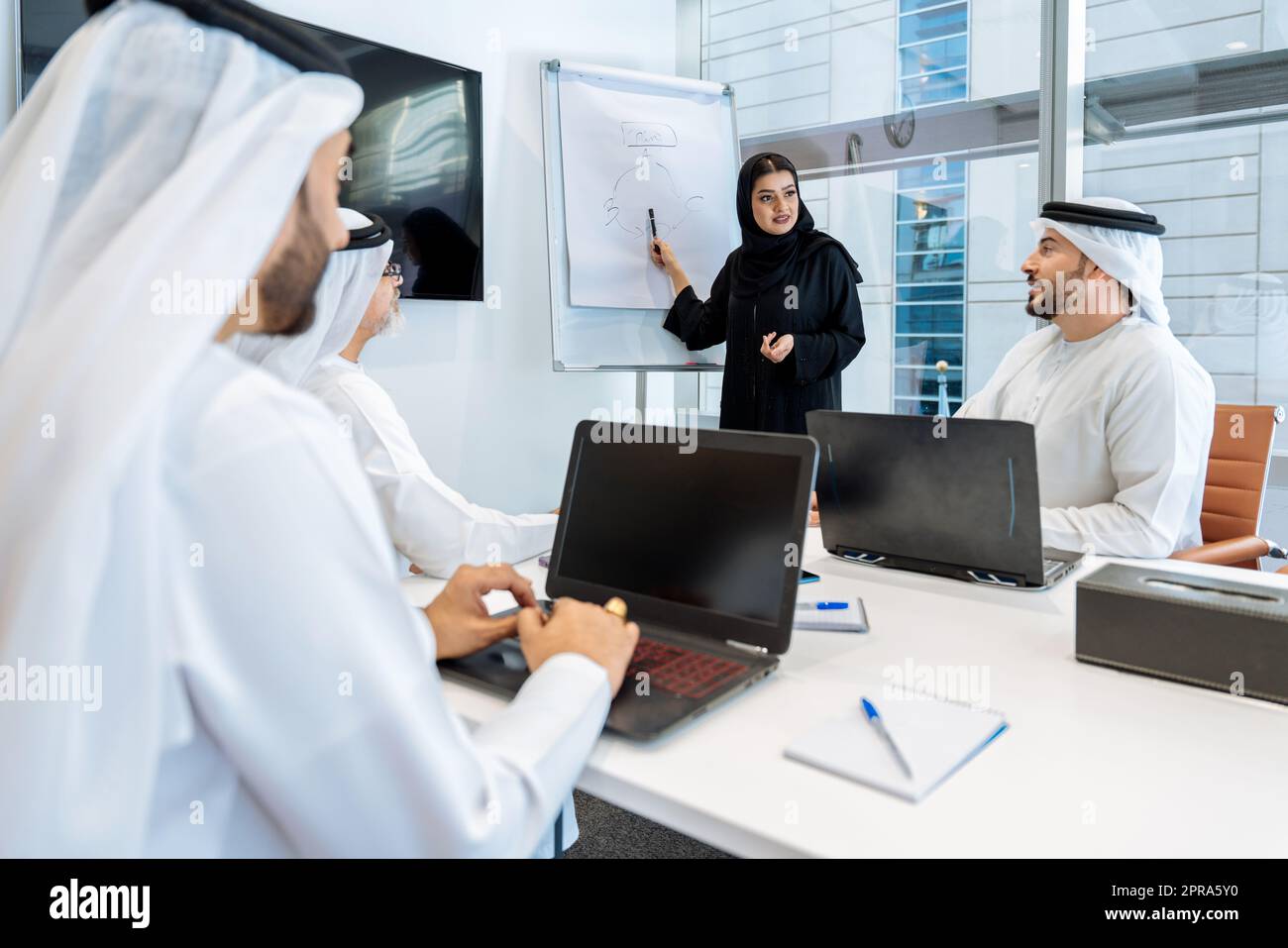 Group of middle-eastern corporate business people wearing traditional ...