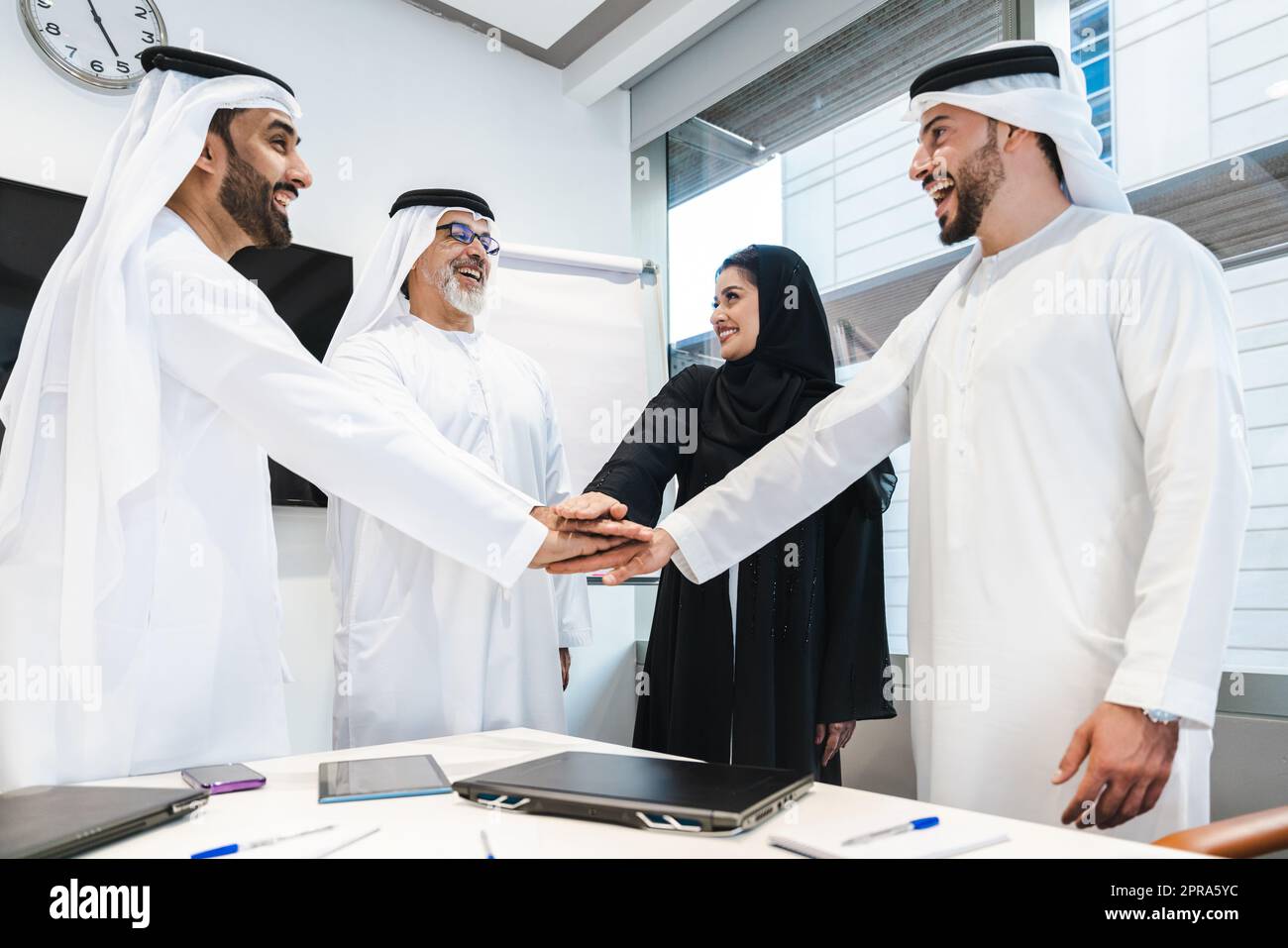 Group of middle-eastern corporate business people wearing traditional ...
