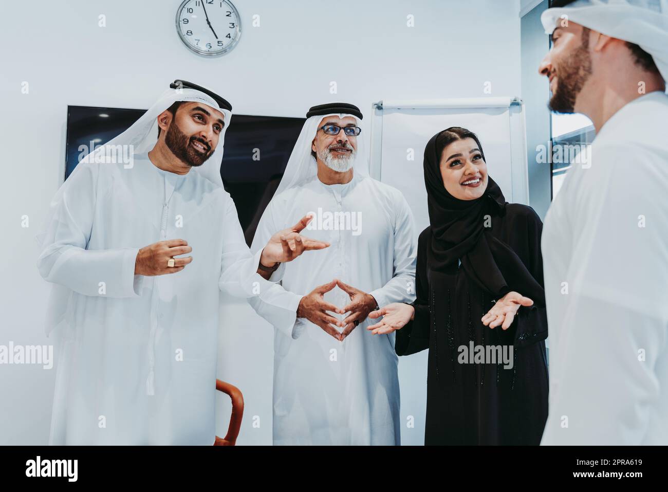 Group of middle-eastern corporate business people wearing traditional ...