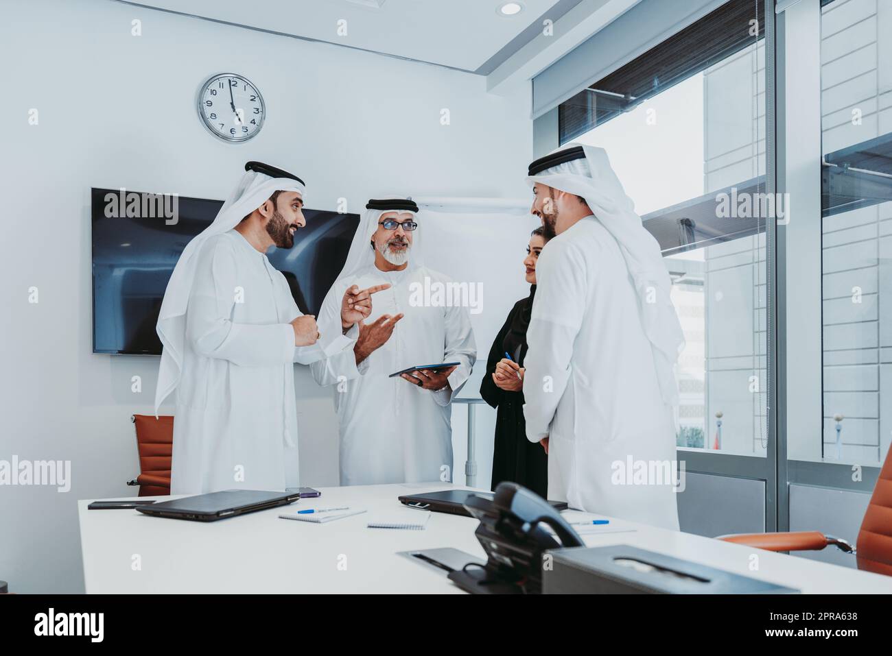 Group of middle-eastern corporate business people wearing traditional ...