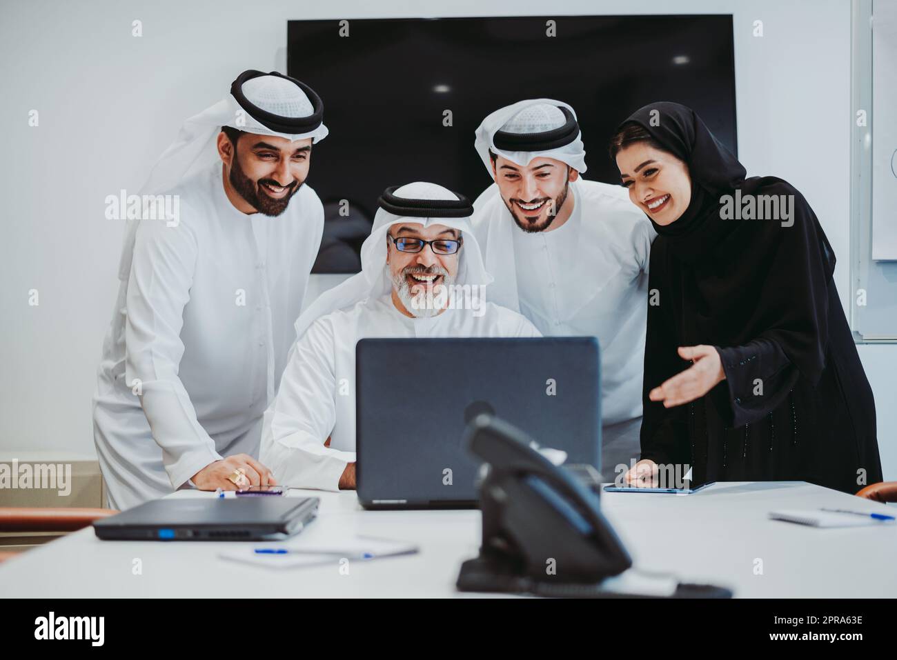 Group of middle-eastern corporate business people wearing traditional ...