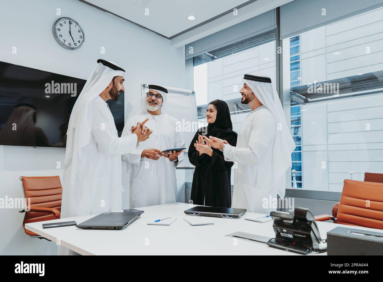 Group of middle-eastern corporate business people wearing traditional ...