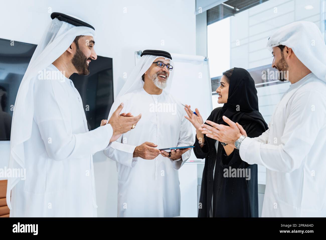 Group of middle-eastern corporate business people wearing traditional ...