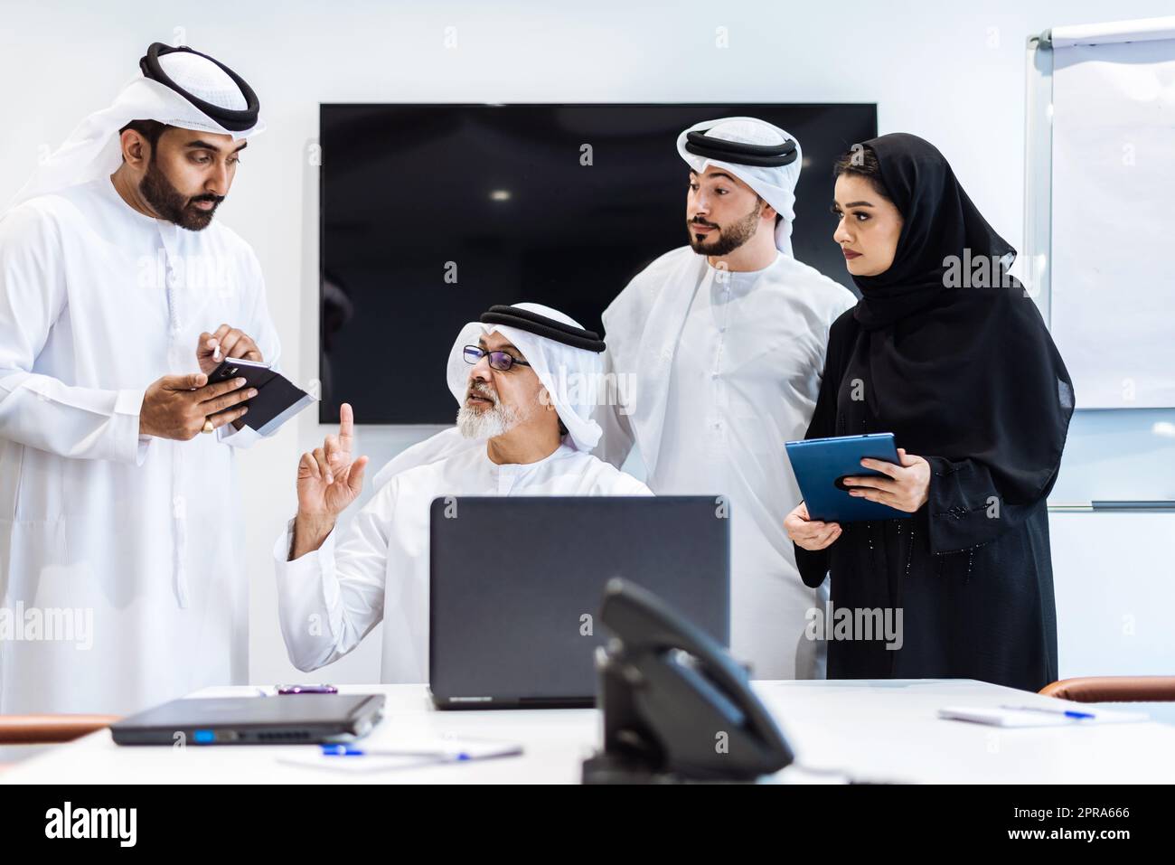 Group of middle-eastern corporate business people wearing traditional ...