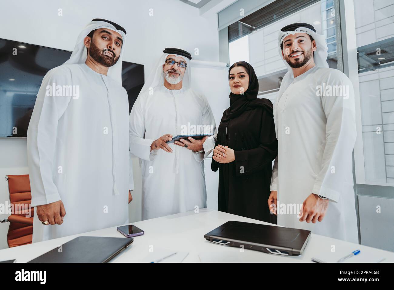 Group of middle-eastern corporate business people wearing traditional ...