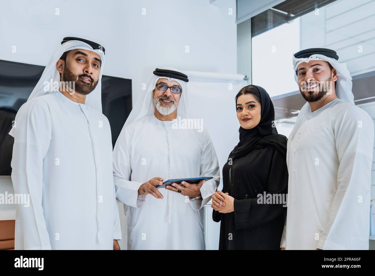 Group of middle-eastern corporate business people wearing traditional ...