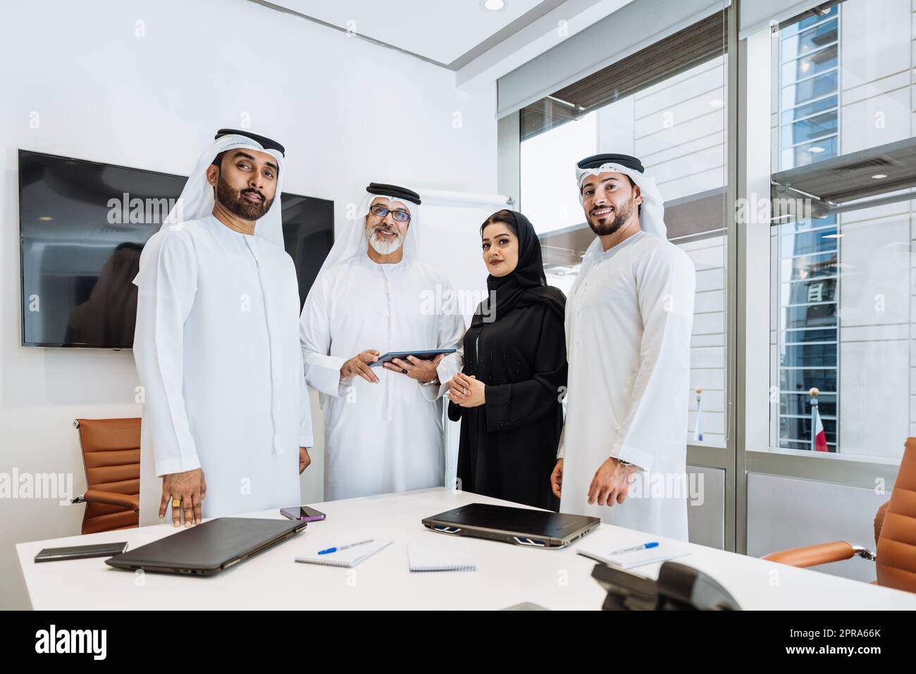 Group of middle-eastern corporate business people wearing traditional ...