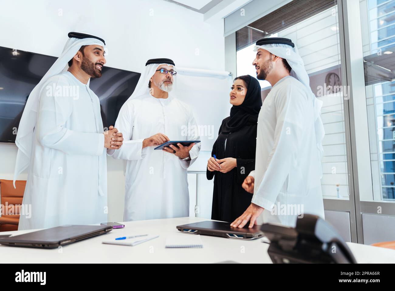 Group of middle-eastern corporate business people wearing traditional ...