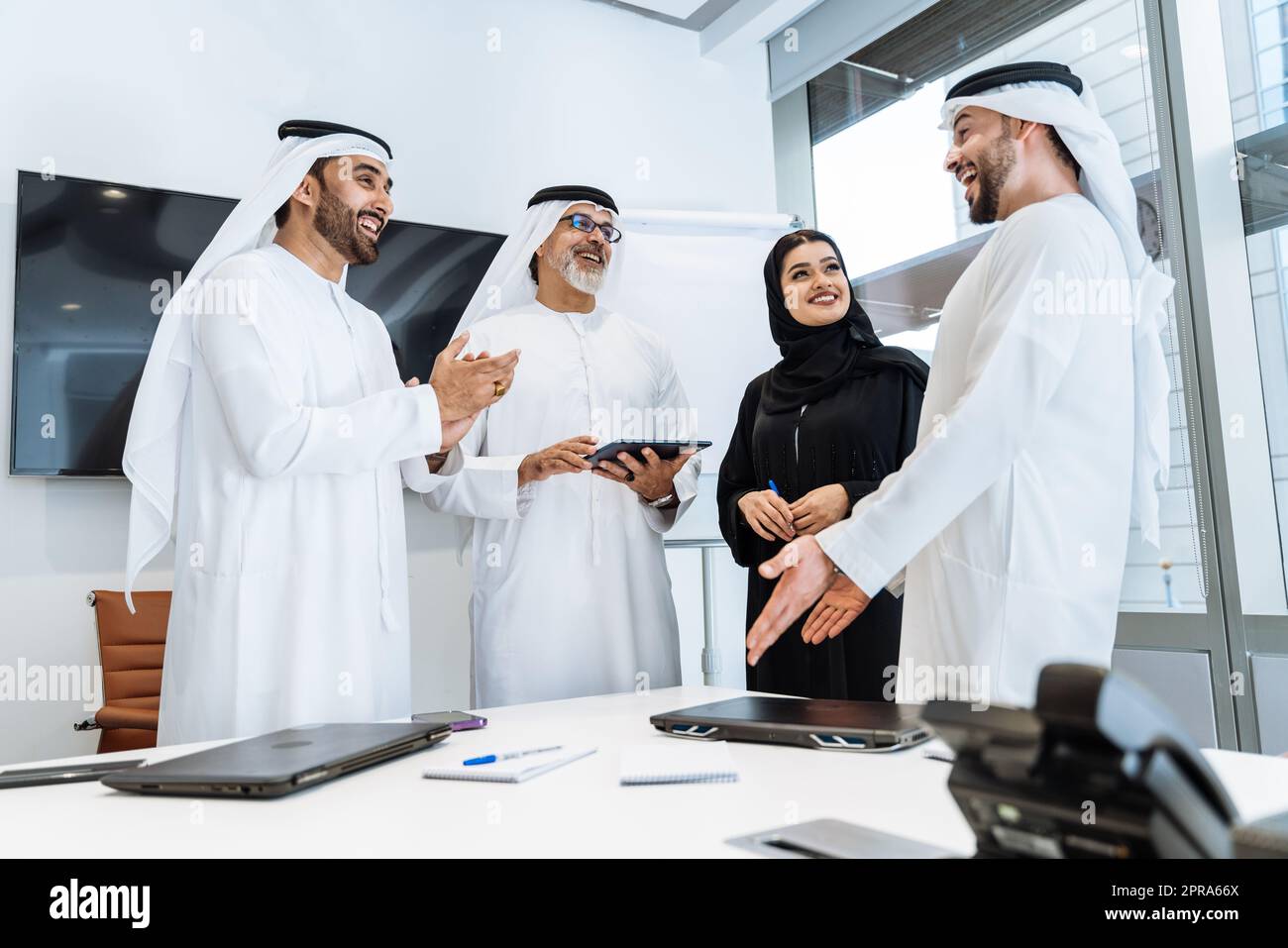 Group of middle-eastern corporate business people wearing traditional ...