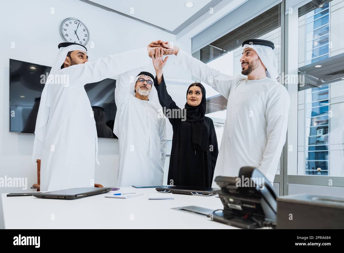 Group of middle-eastern corporate business people wearing traditional ...