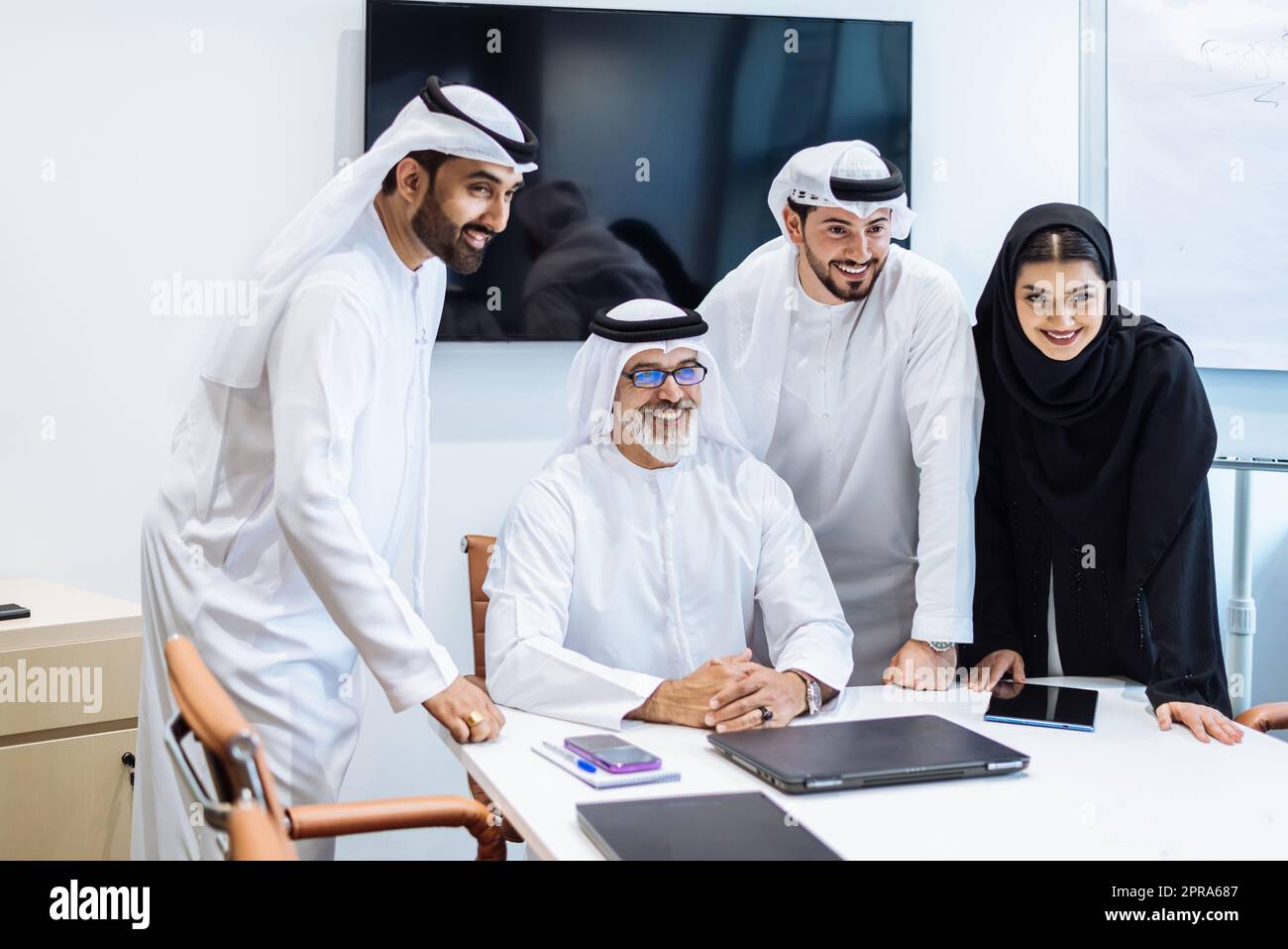 Group of middle-eastern corporate business people wearing traditional ...