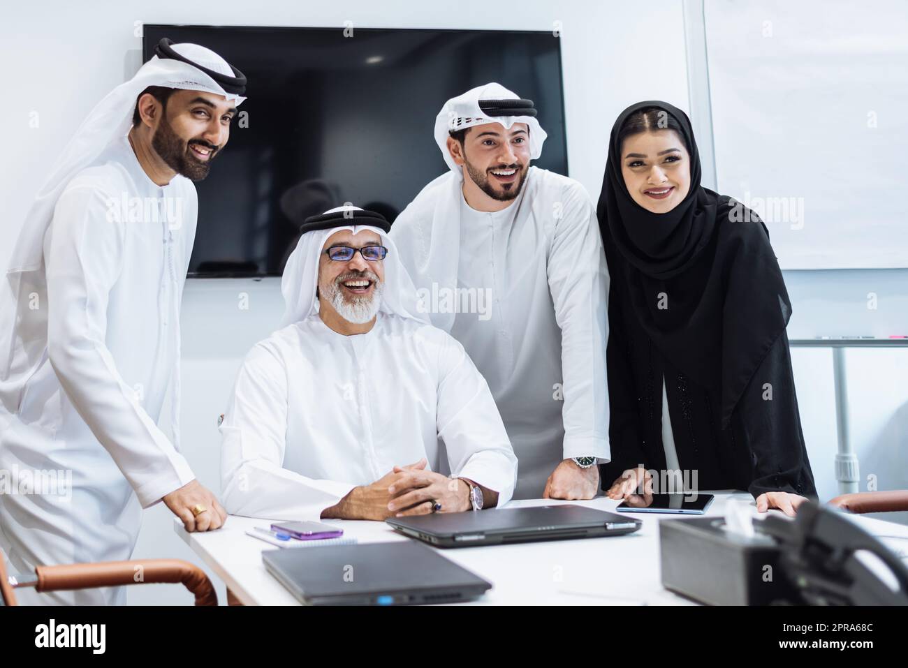 Group of middle-eastern corporate business people wearing traditional ...