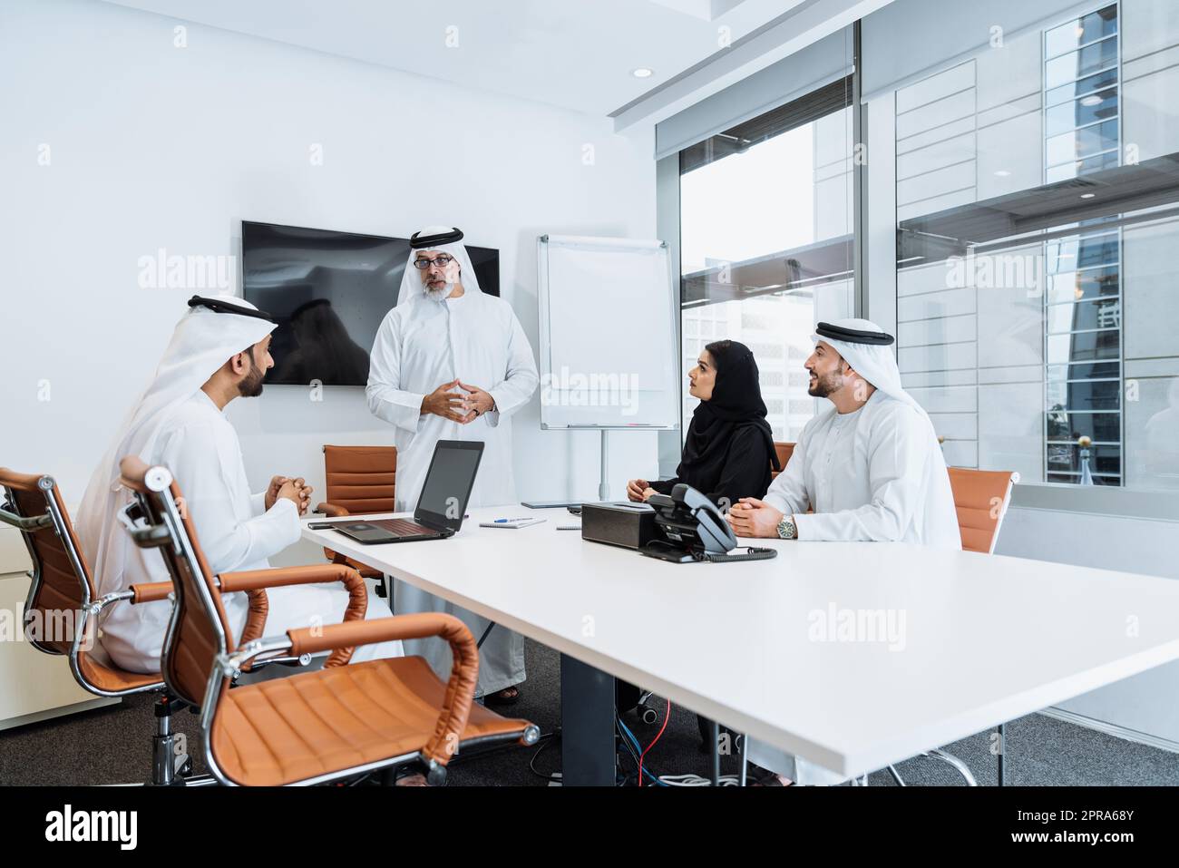 Group of middle-eastern corporate business people wearing traditional ...