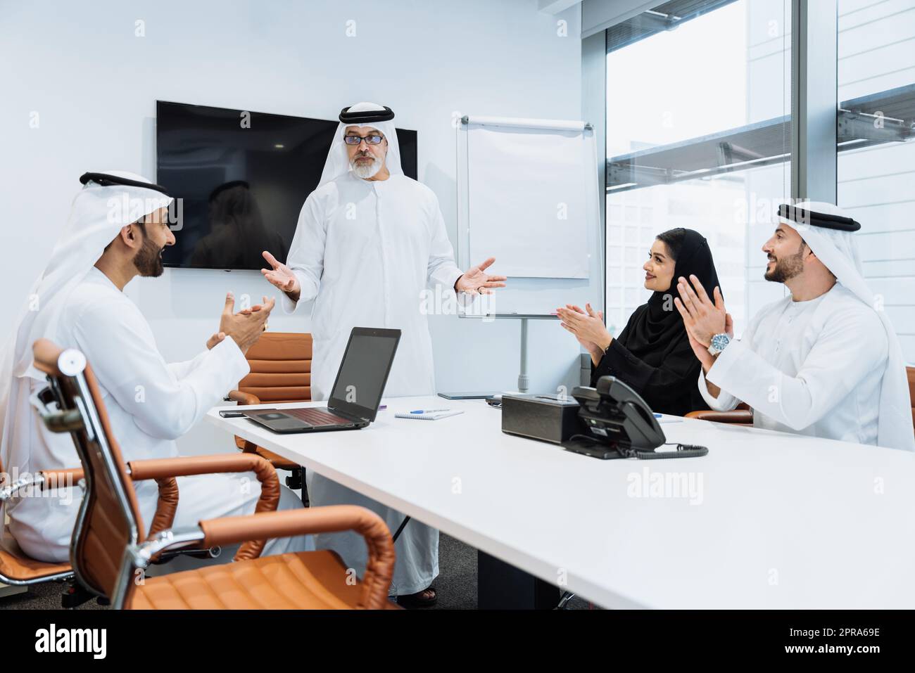 Group of middle-eastern corporate business people wearing traditional ...
