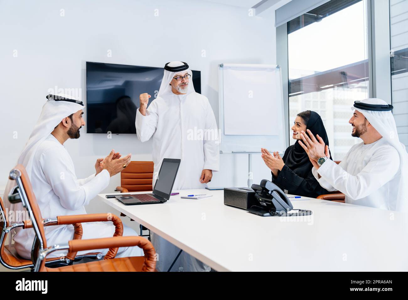 Group of middle-eastern corporate business people wearing traditional ...