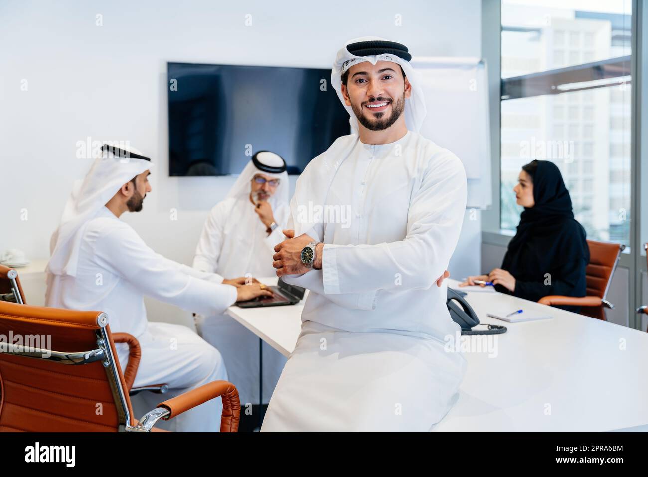 Group of middle-eastern corporate business people wearing traditional ...