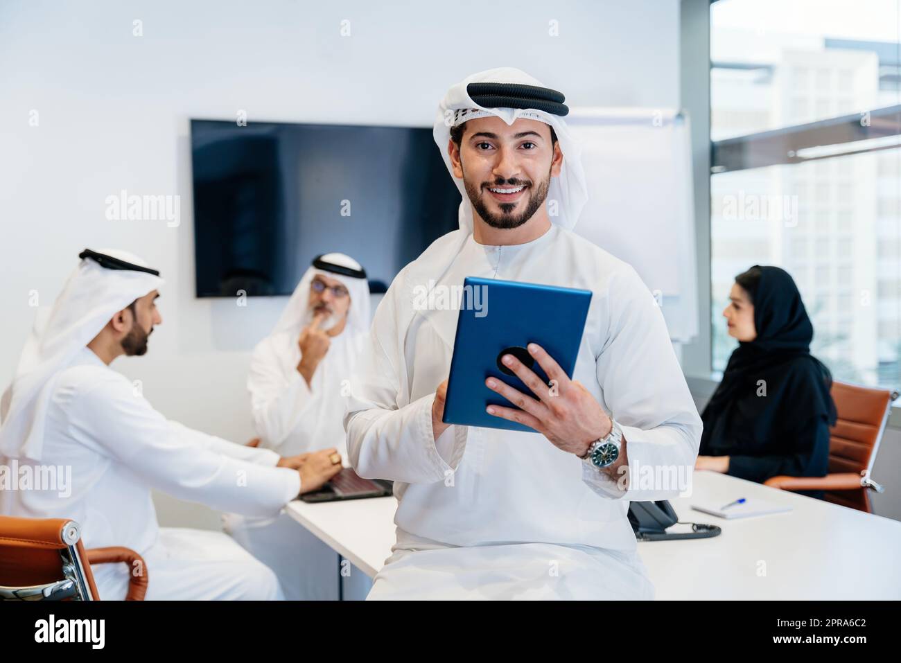 Group of middle-eastern corporate business people wearing traditional ...