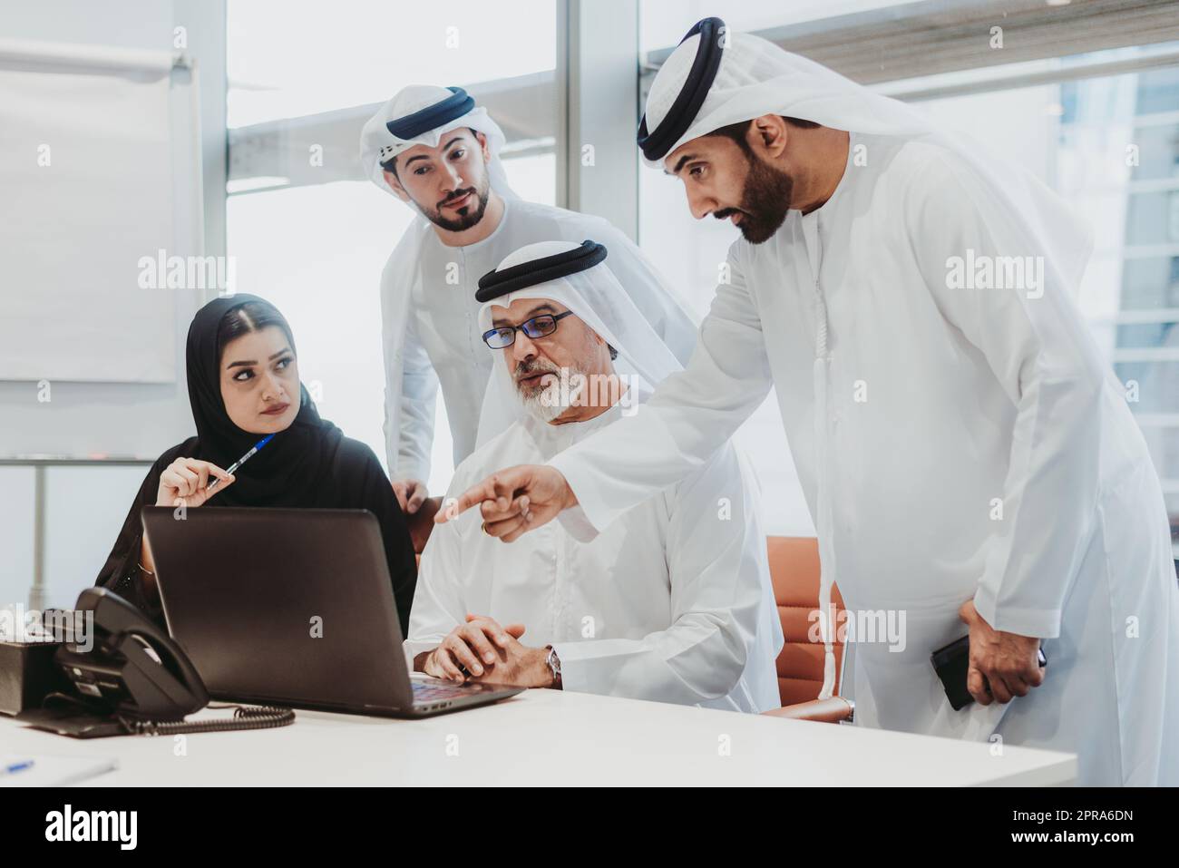 Group of middle-eastern corporate business people wearing traditional ...