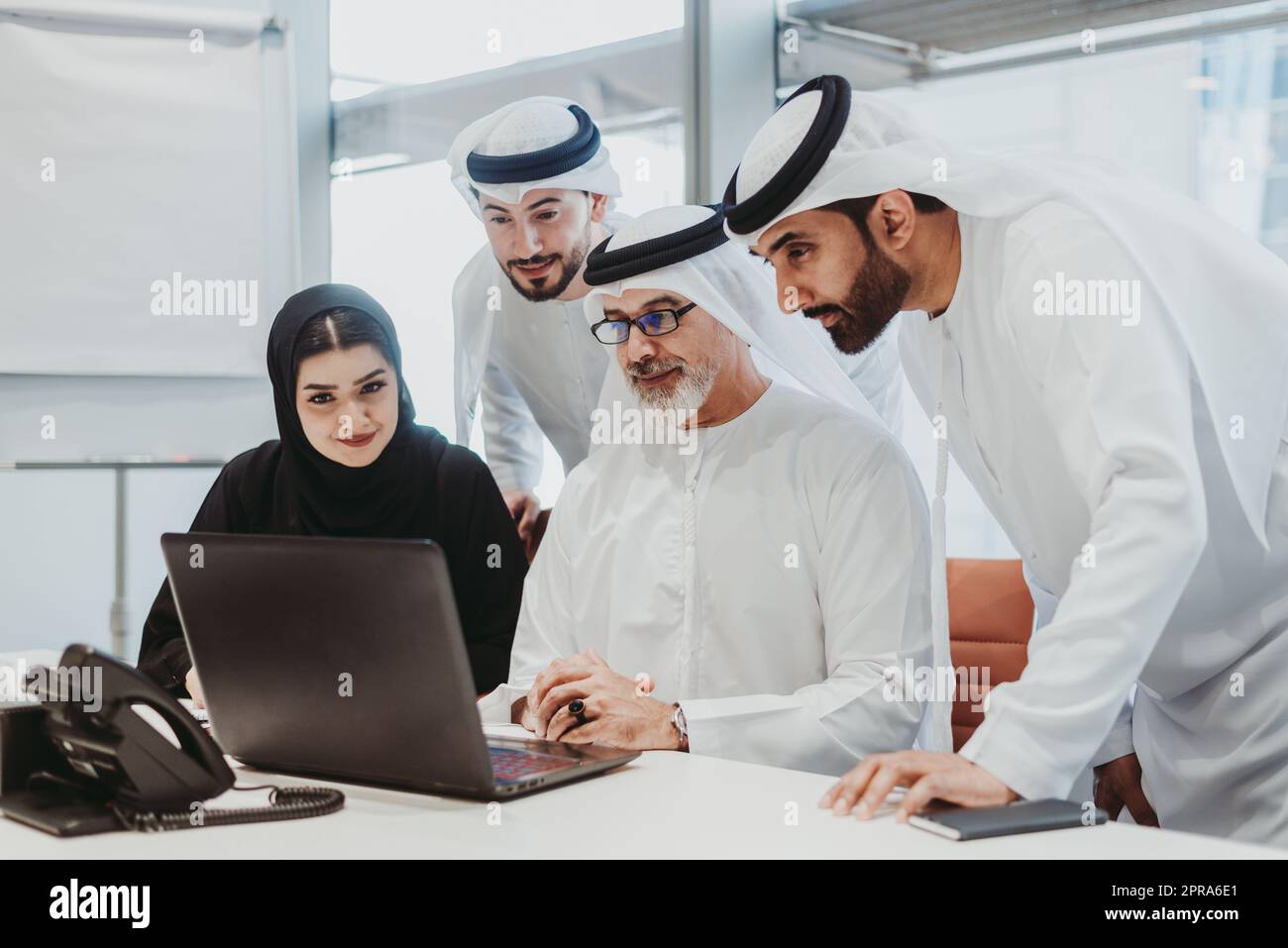 Group of middle-eastern corporate business people wearing traditional ...