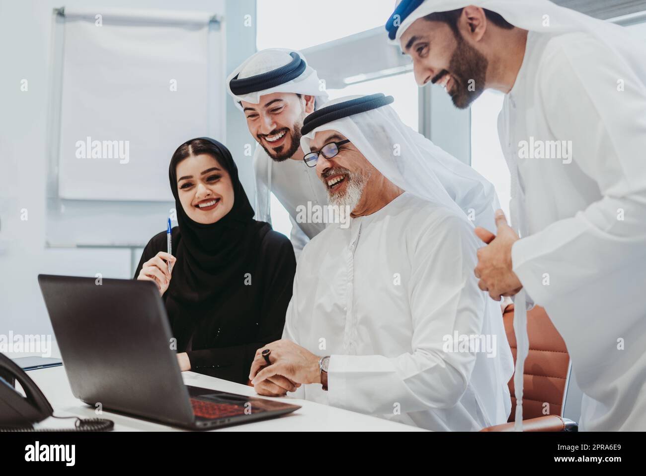 Group of middle-eastern corporate business people wearing traditional ...