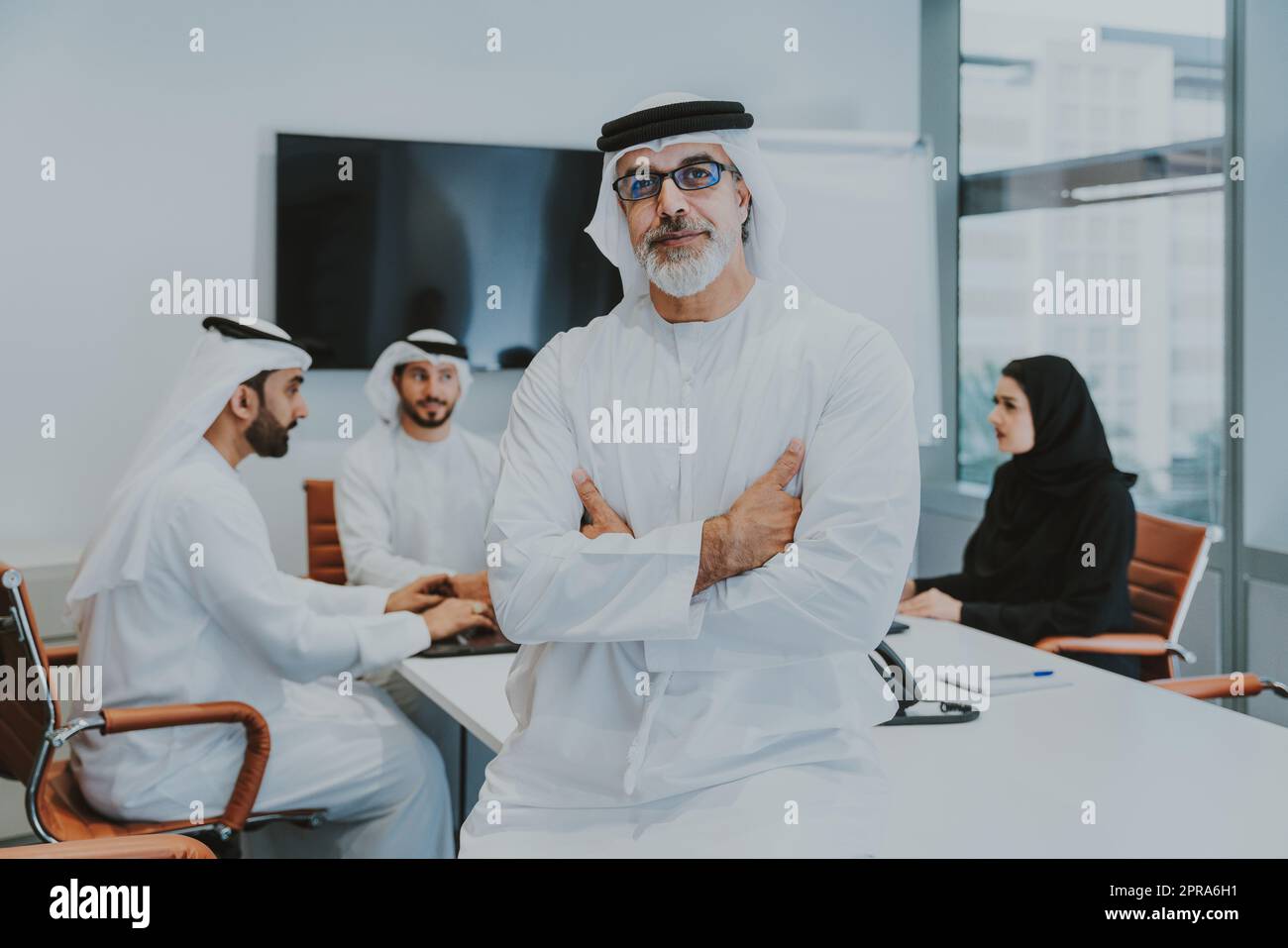 Group of middle-eastern corporate business people wearing traditional ...
