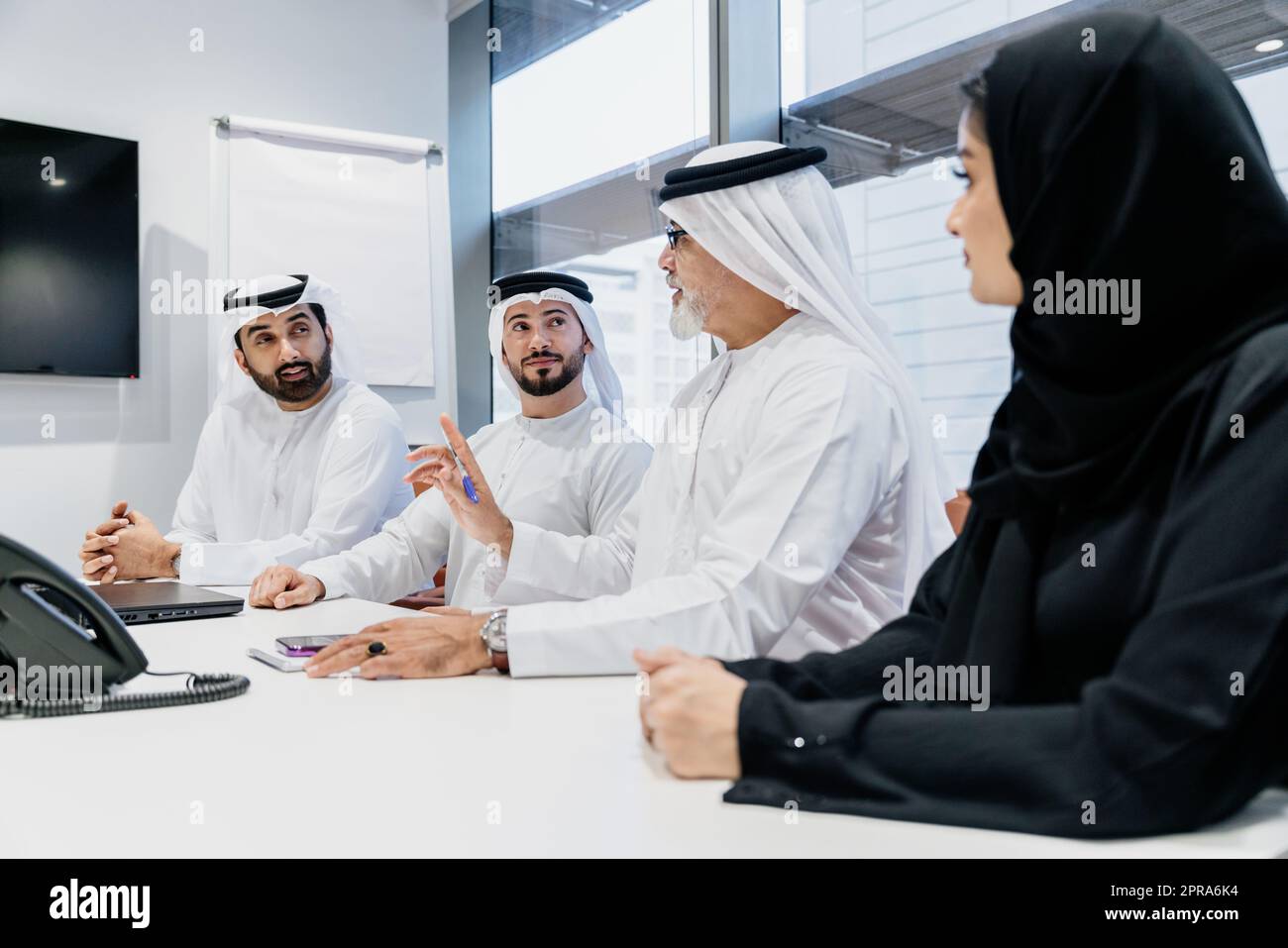 Group of middle-eastern corporate business people wearing traditional ...