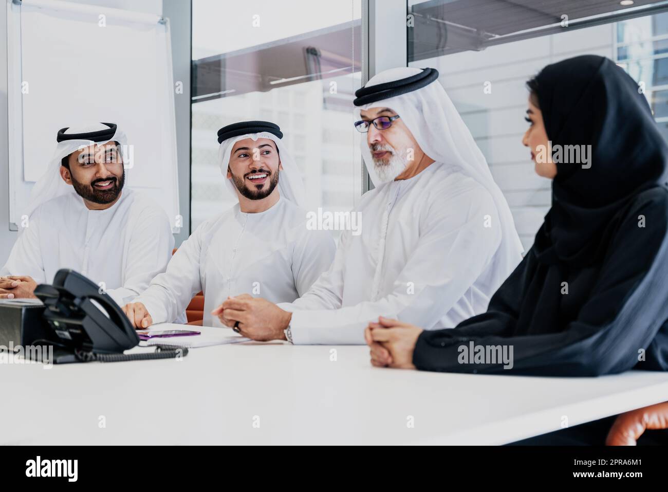 Group of middle-eastern corporate business people wearing traditional ...
