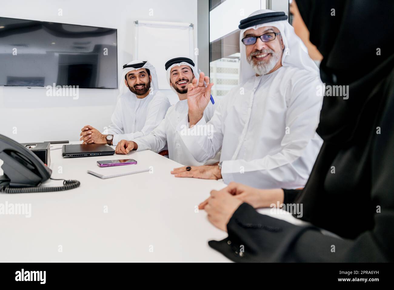 Group of middle-eastern corporate business people wearing traditional ...