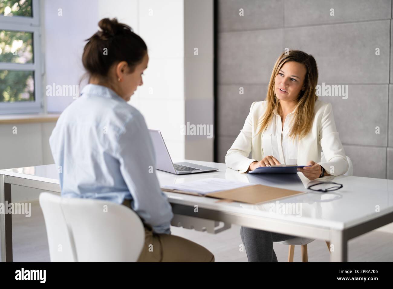 Girl interview desk hi-res stock photography and images - Alamy