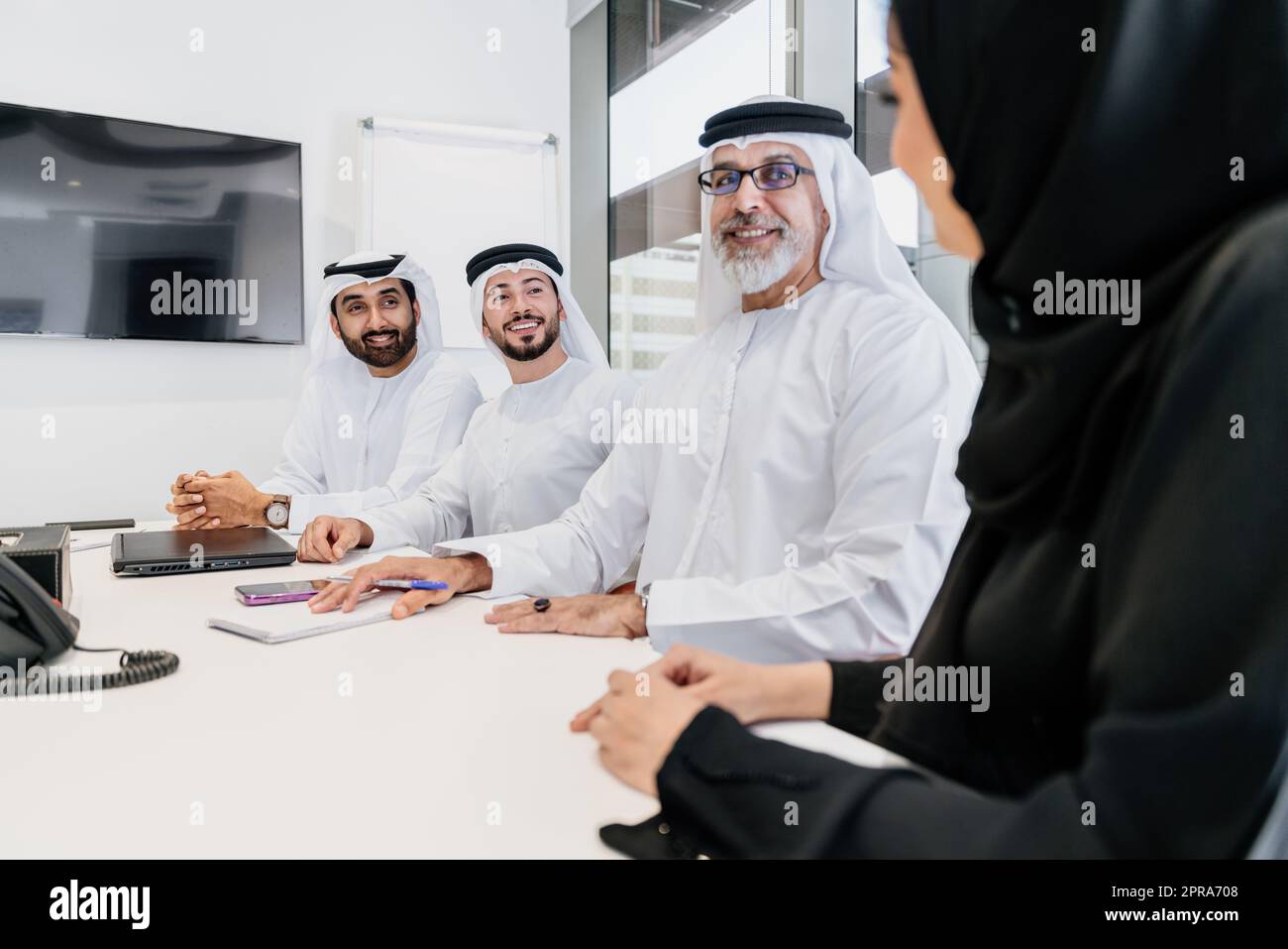 Group of middle-eastern corporate business people wearing traditional ...