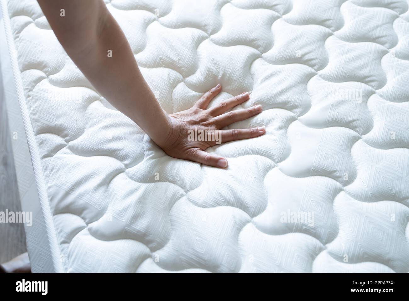 Hand Testing Orthopedic Memory Foam Core Stock Photo - Alamy