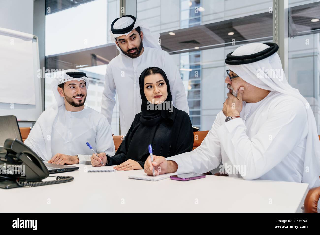 Group of middle-eastern corporate business people wearing traditional ...