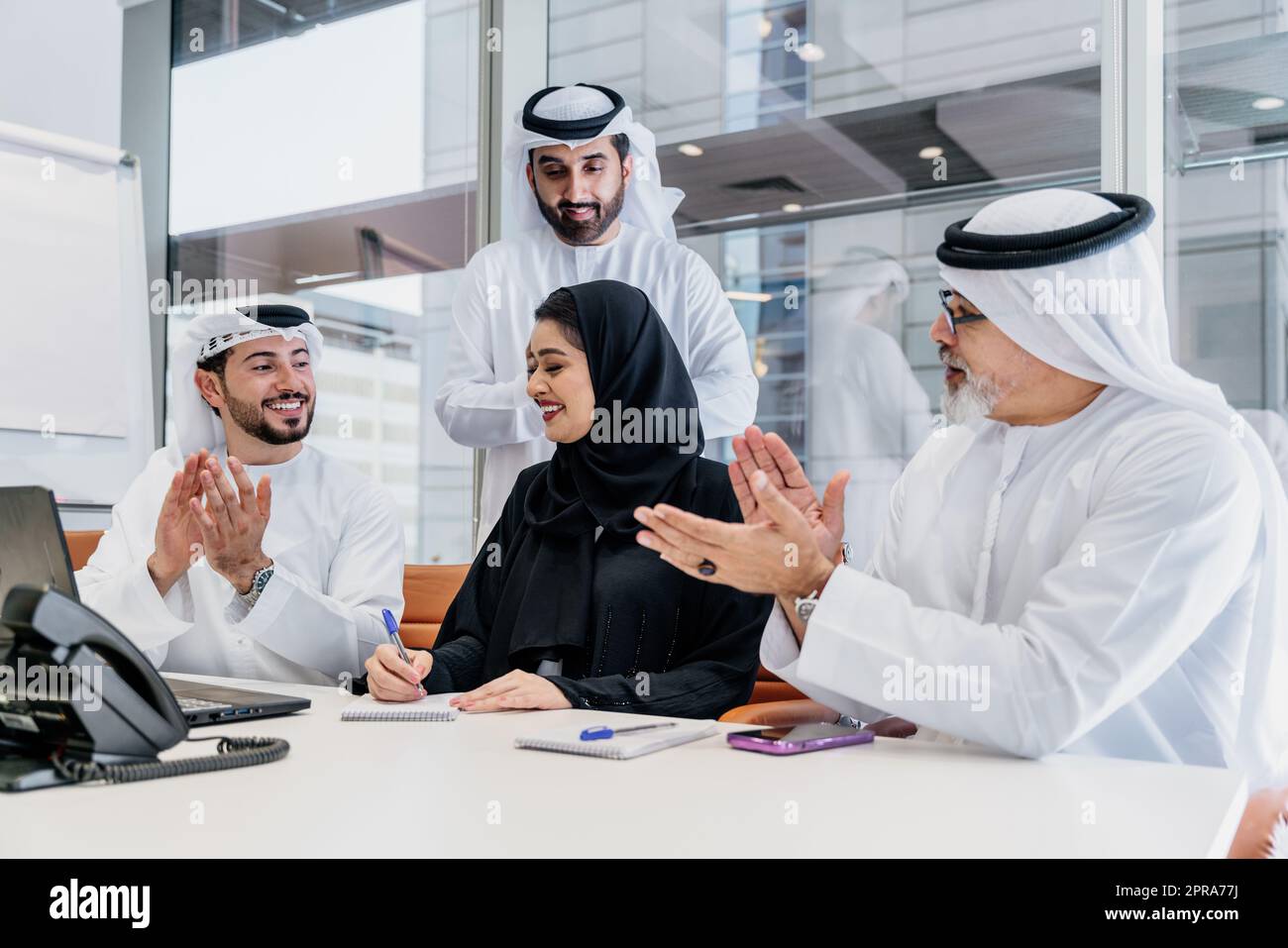 Group of middle-eastern corporate business people wearing traditional ...