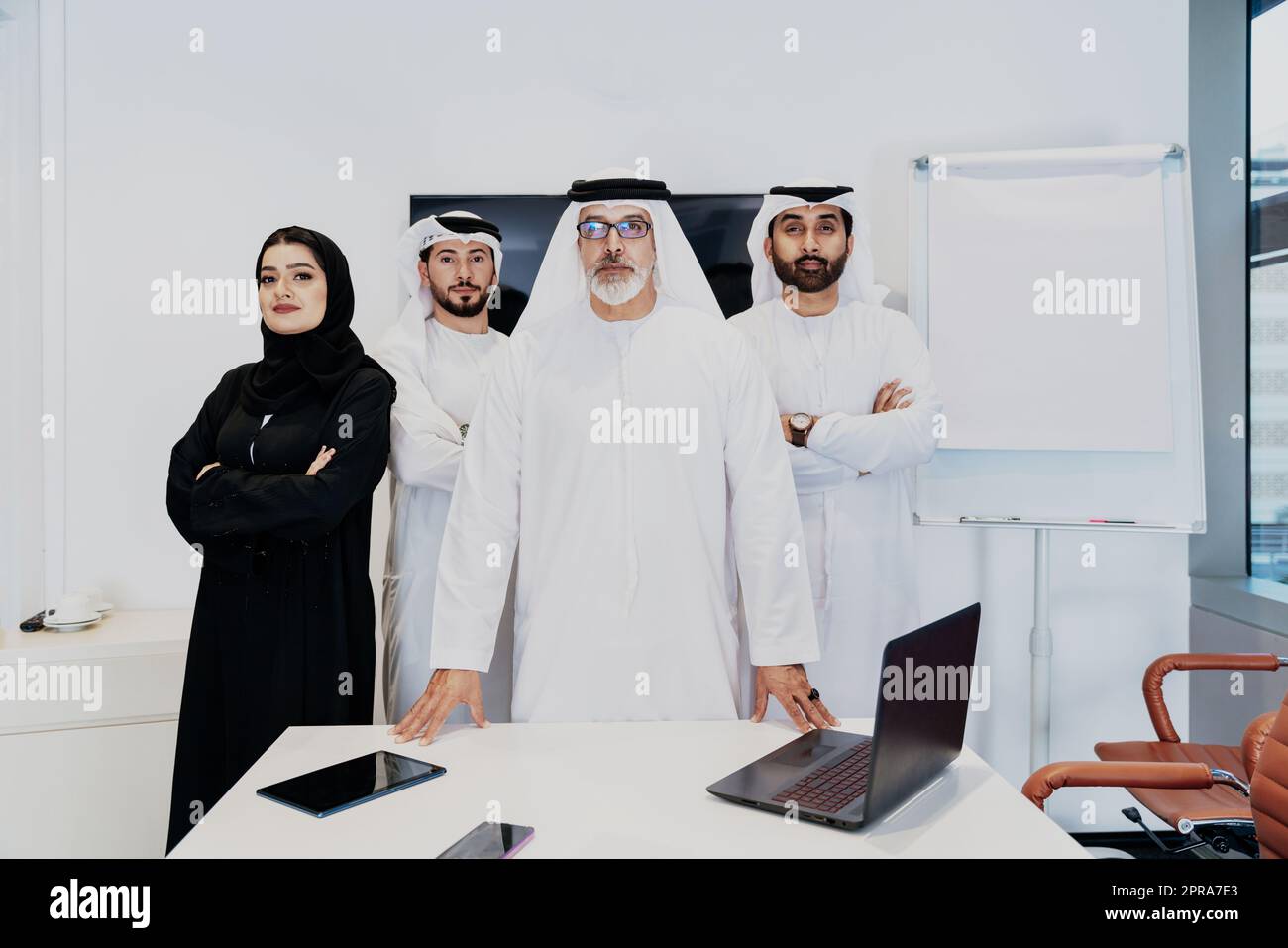 Group of middle-eastern corporate business people wearing traditional ...