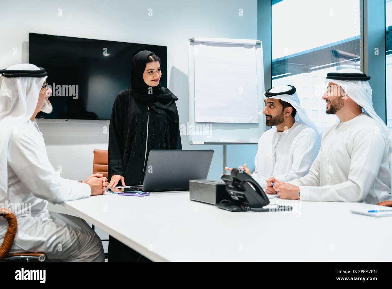 Group of middle-eastern corporate business people wearing traditional ...